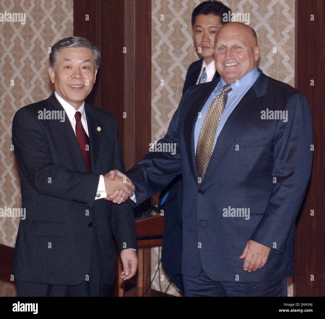 TOKYO, Japan - Japanese Vice Foreign Minister Yukio Takeuchi (L) and U ...