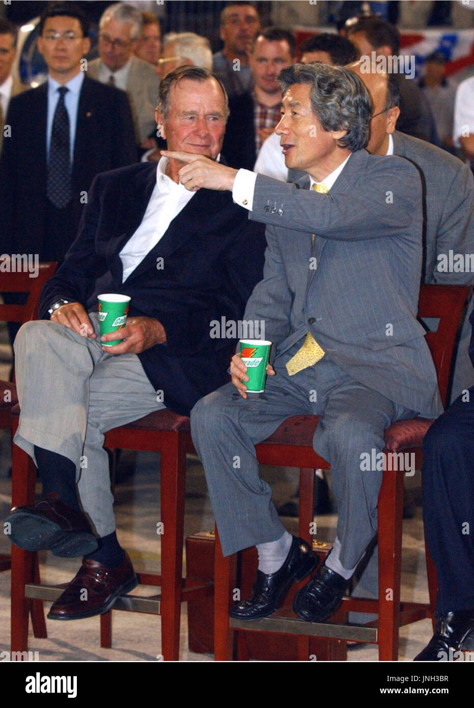 BOSTON, United States - Former U.S. President George Bush (L) and ...