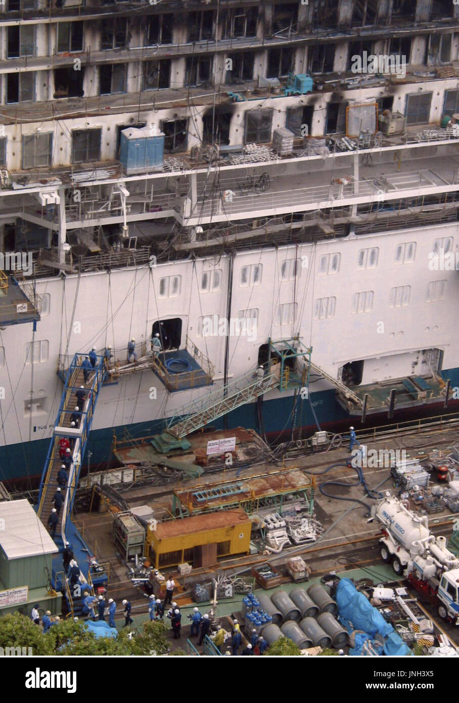 NAGASAKI, Japan - Police, coast guard and fire department officials ...
