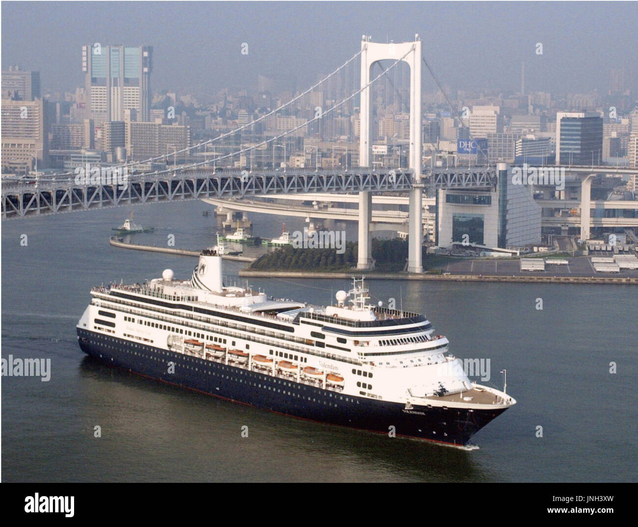 TOKYO, Japan - The 63,000-ton luxury cruise ship Volendam sails under ...