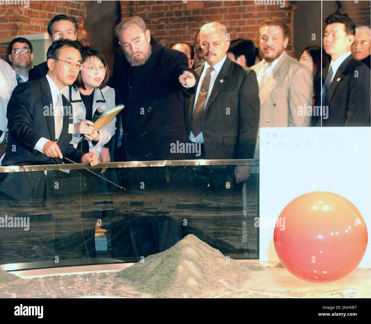 HIROSHIMA, Japan - Cuban President Fidel Castro (3rd from L) is briefed ...