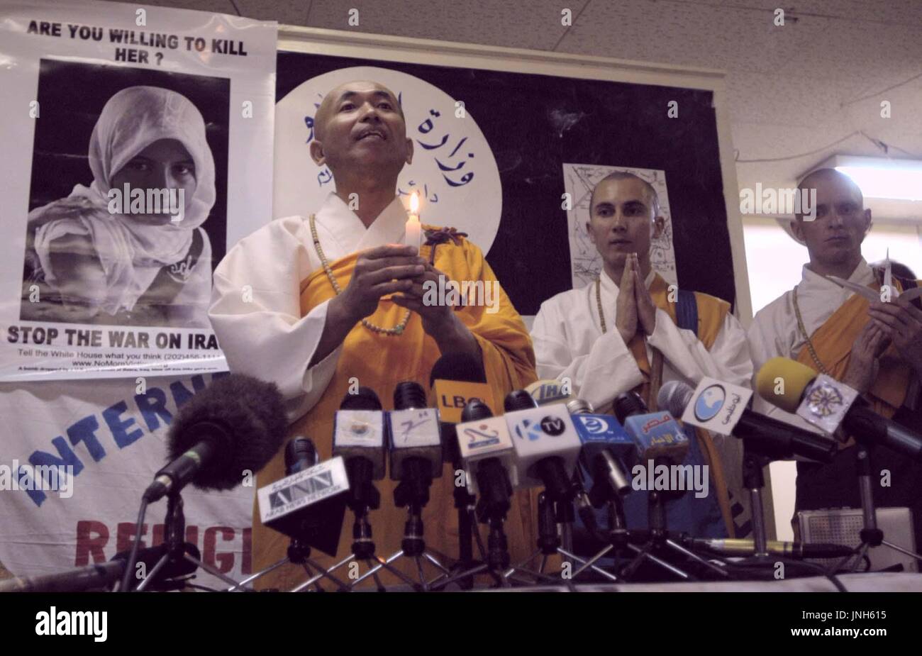 BAGHDAD, Iraq - Japanese Buddhist monk Junsei Terasawa (L), in Iraq for ...