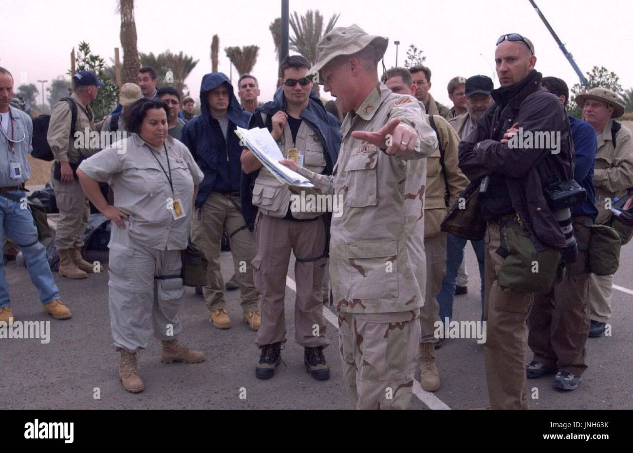 CAMP HAMMER, Kuwait - U.S. Army public relations officer (center) on ...