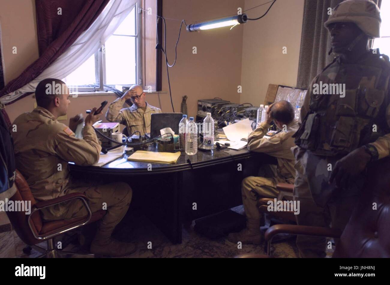 BAGHDAD, Iraq - U.S. soldiers work in an operation command room set up ...