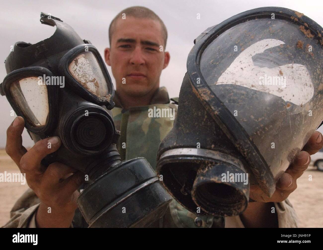 BAGHDAD, Iraq - A U.S. Marine Corps soldier on April 19 shows gas masks ...
