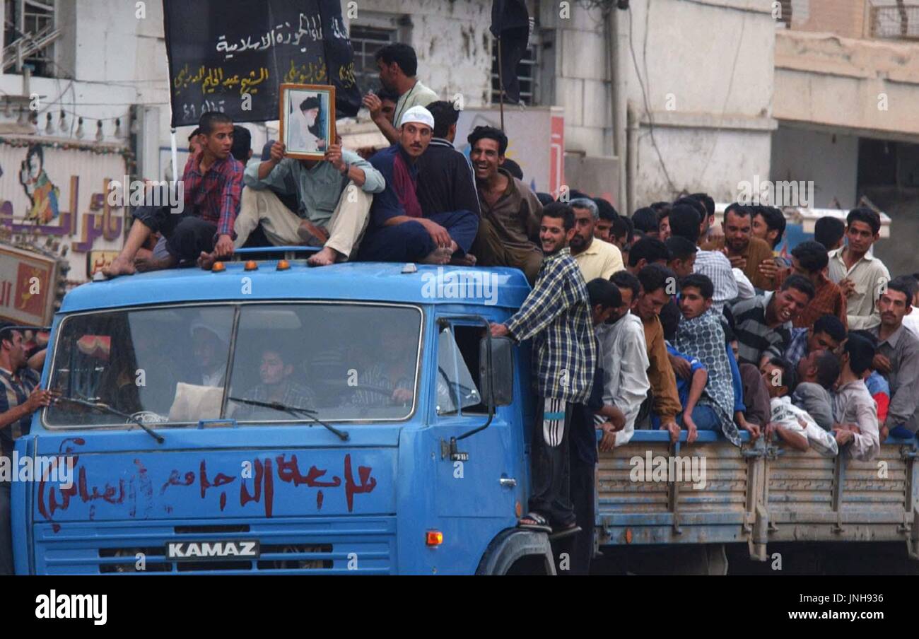 BAGHDAD, Iraq - A pickup truck loaded with Shiite Muslims in Baghdad ...