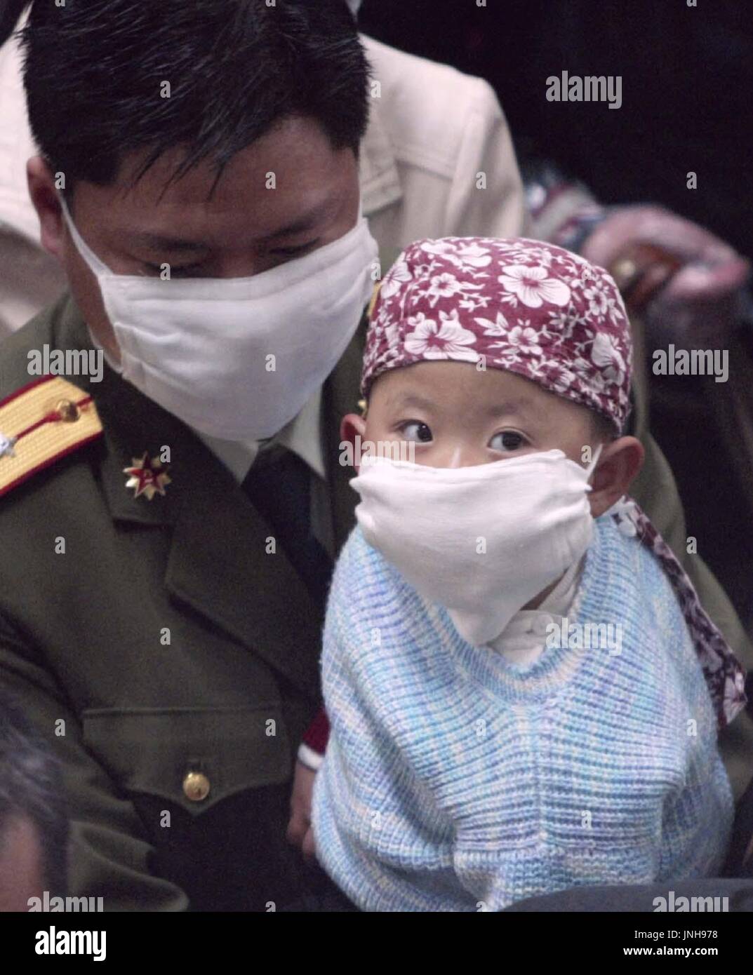 BEIJING, China - A child wears a new type of face mask at Beijing ...