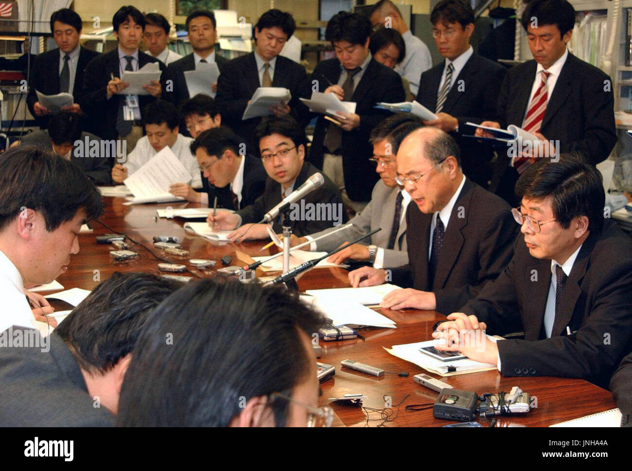 TOKYO, Japan - Resona Holdings Inc. President Yasuhisa Katsuta (seated ...