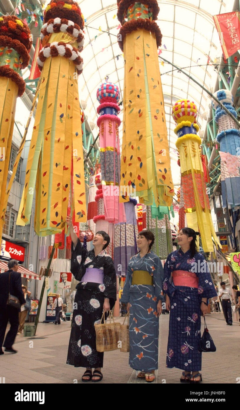 SENDAI, Japan - Women, clad in traditional ''yukata'' (summer cotton ...