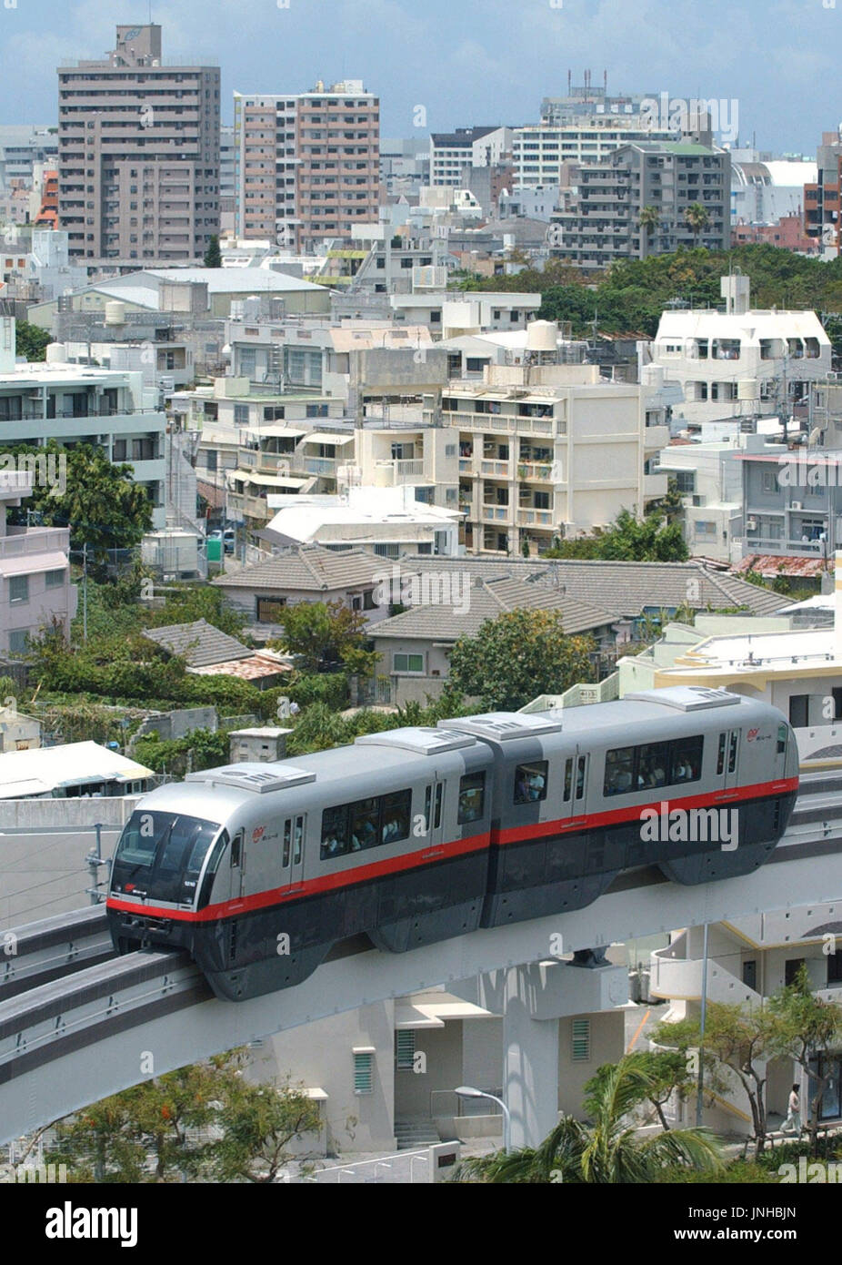 NAHA, Japan - Okinawa's first postwar railway train opened to the ...