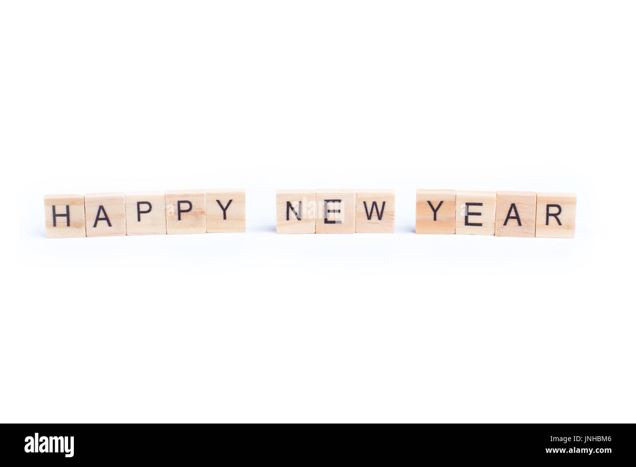 HAPPY NEW YEAR word on square tile concept isolated on white background ...