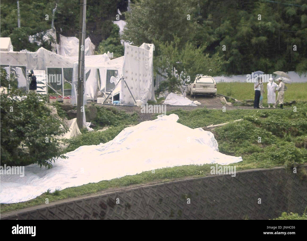 FUKUI, Japan - The Pana Wave Laboratory group removed white cloth on ...