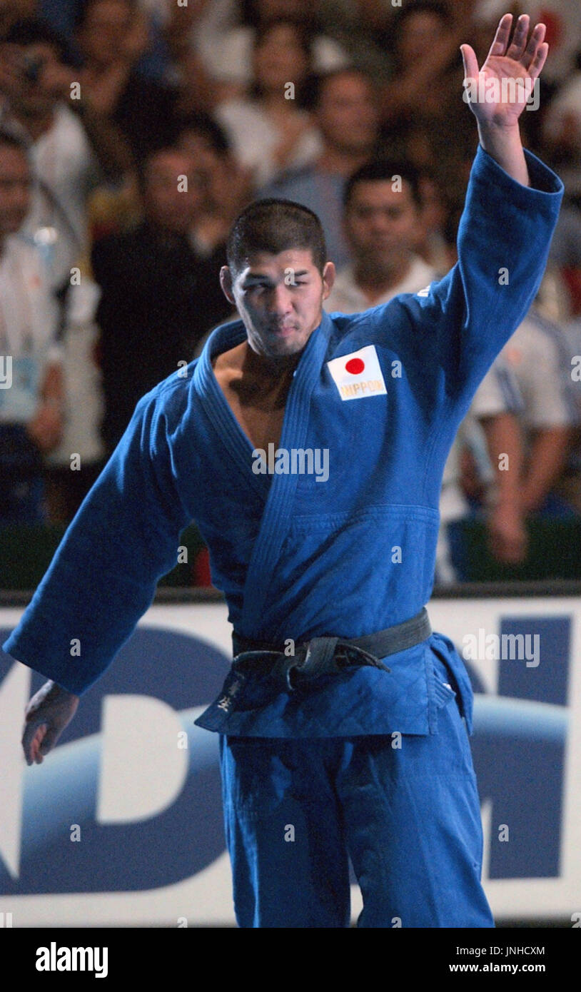 OSAKA, Japan - Kosei Inoue of Japan waves to spectators after beating ...