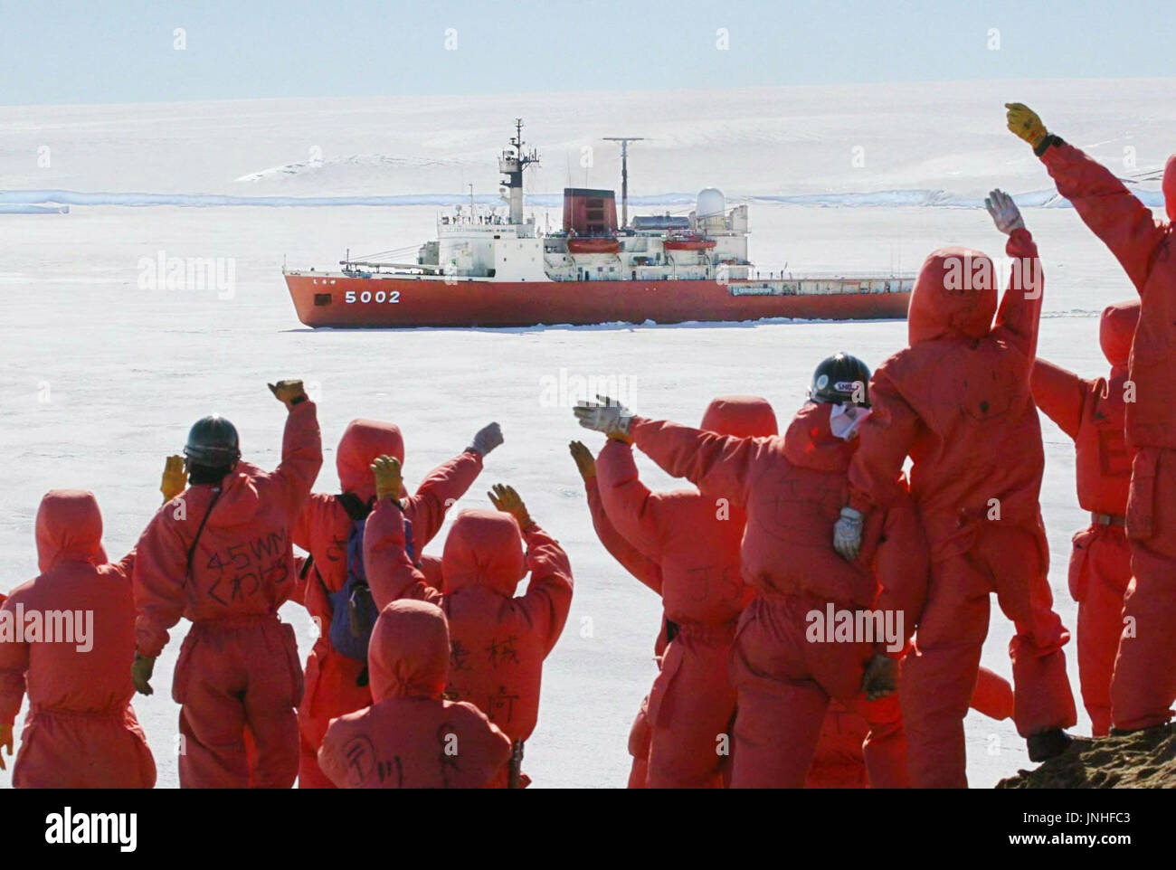 SHOWA BASE, Antarctica - Japanese researchers wave at the icebreaker ...