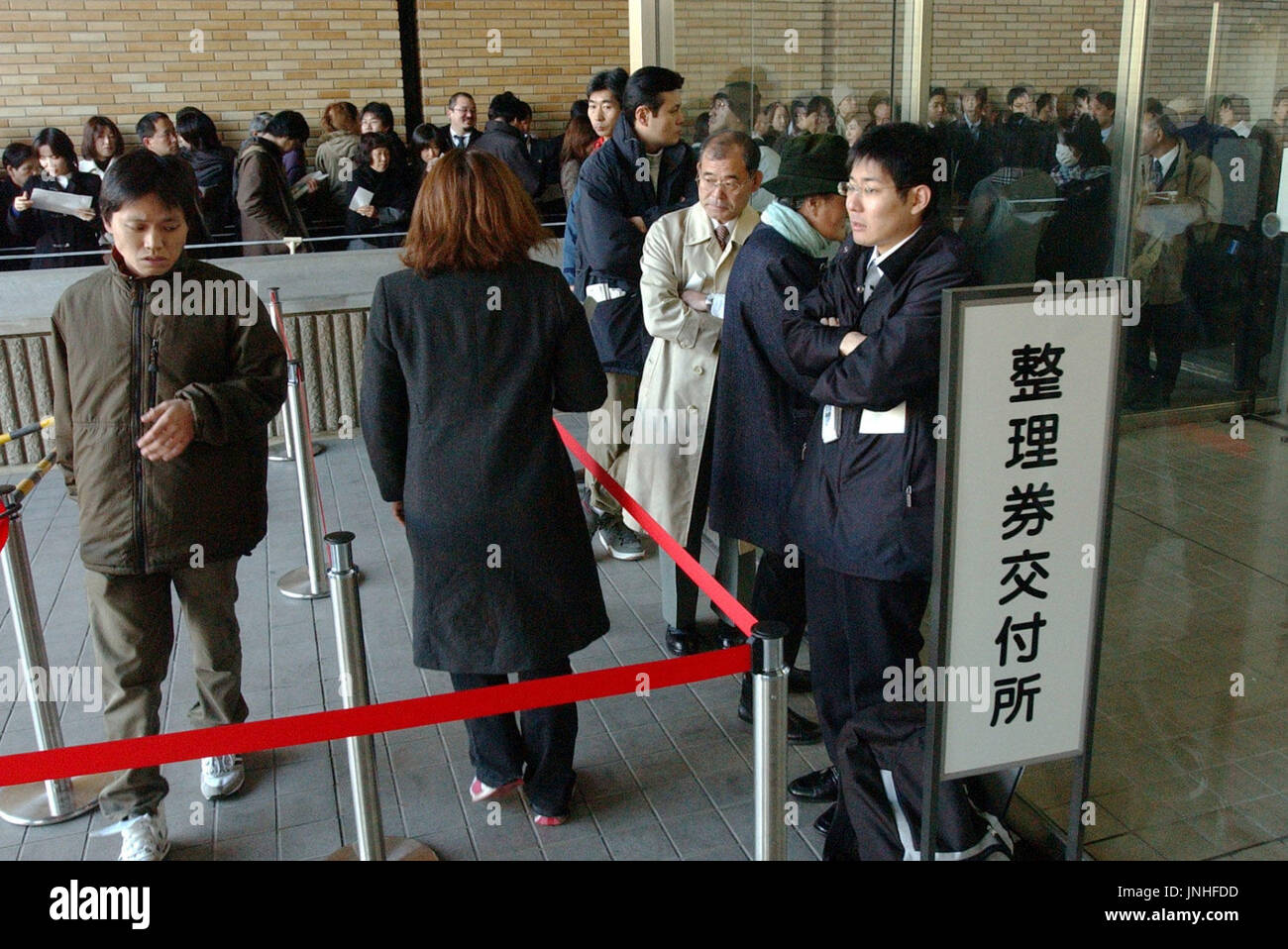 SAITAMA, Japan - People queue outside the Saitama District Court on Dec ...