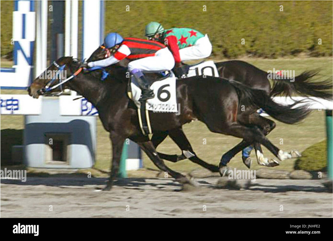 TAKARAZUKA, Japan - Japanese jockey Yutaka Take (6) places first on Win ...