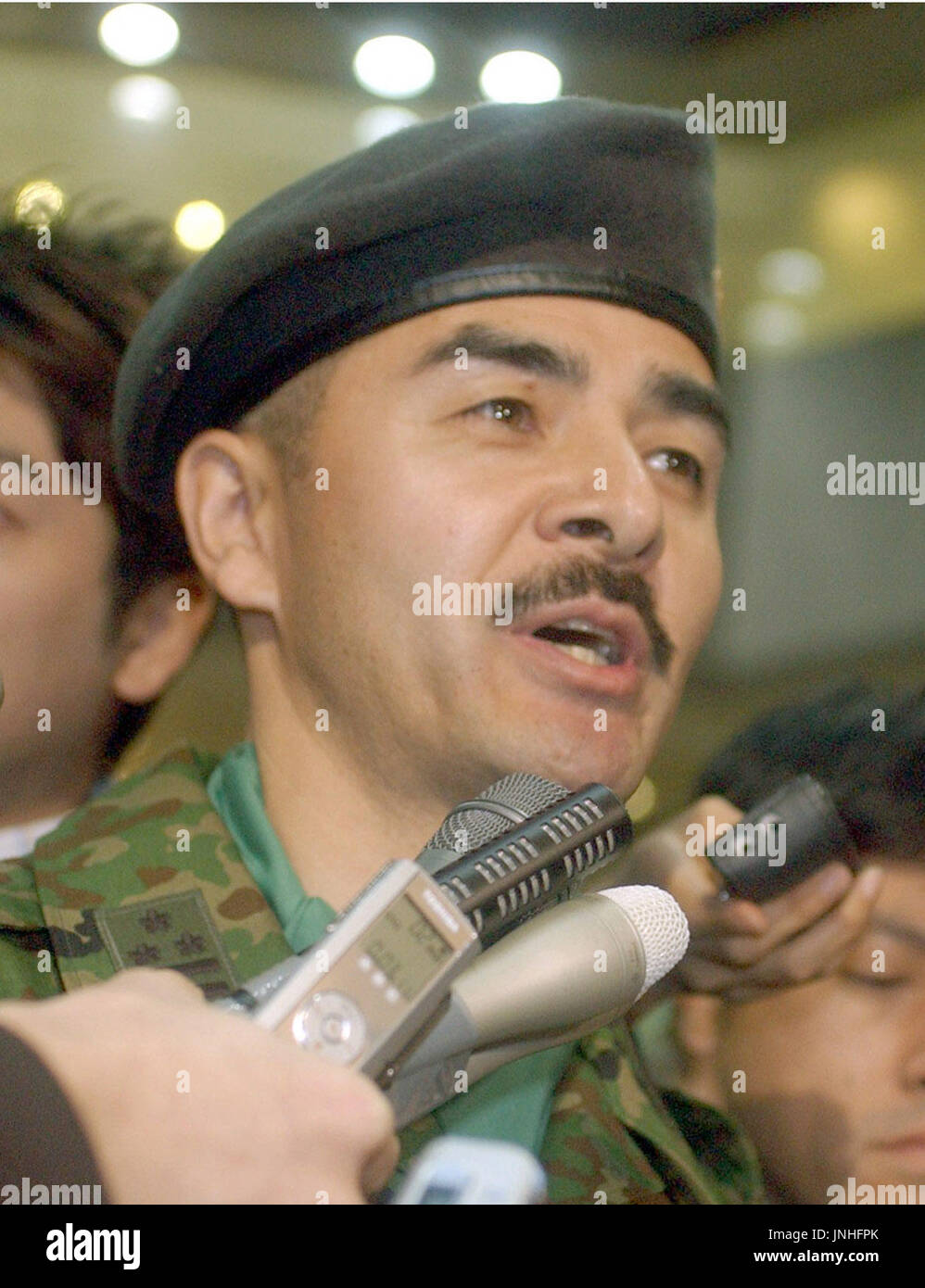 TOKYO, Japan - Col. Masahisa Sato, head of an advance team of Ground ...