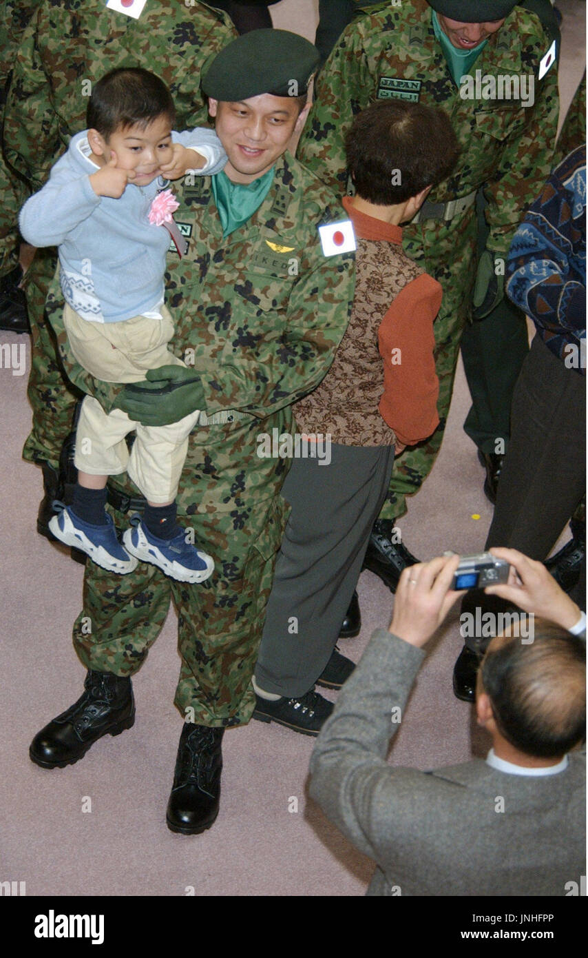 TOKYO, Japan - A Ground Self-Defense Force (GSDF) poses for a ...