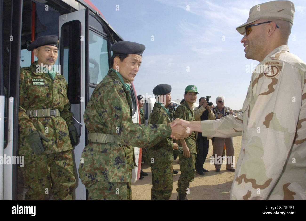 KUWAIT CITY, Kuwait - A U.S. soldier welcomes members of an advance ...