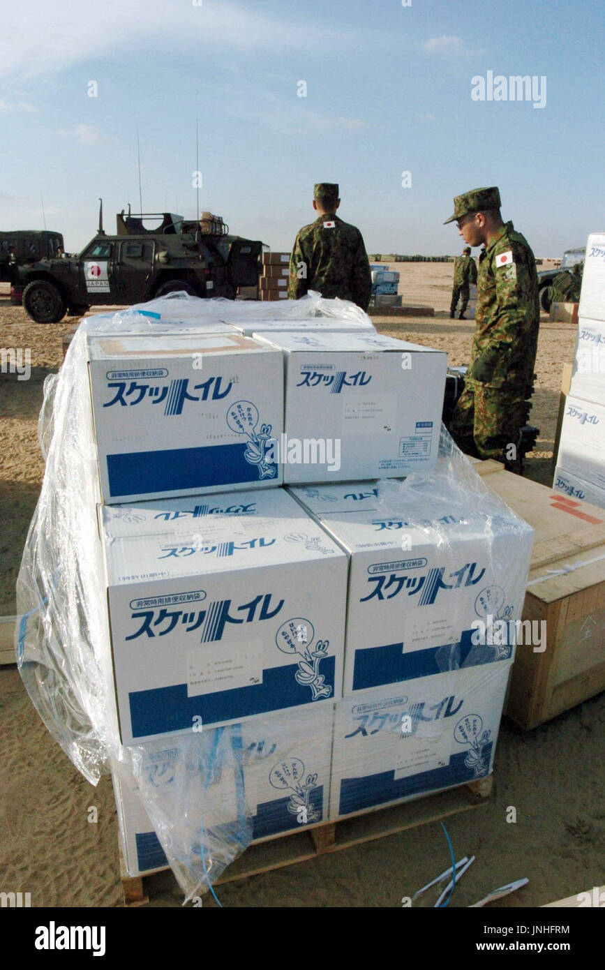 CAMP VIRGINIA, Kuwait - Boxes of goods are unloaded at the U.S. Army's ...