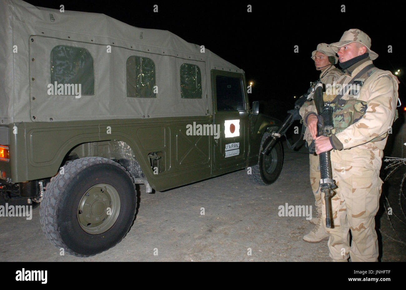 SAMAWAH, Iraq - An armored vehicle carrying an advance team of Japan's ...