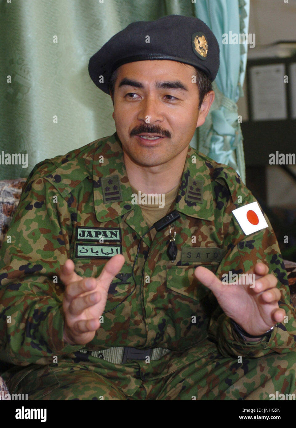 SAMAWAH, Iraq - Col. Masahisa Sato, who heads the advance team for a ...