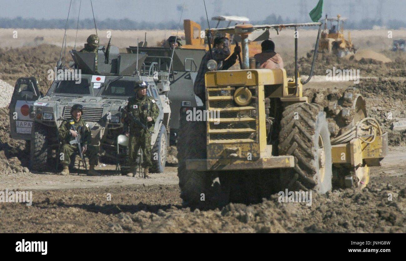 SAMAWAH, Iraq - Tractors on Feb. 10 level the site where a camp will be ...