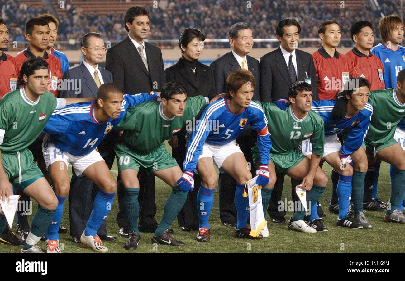 TOKYO, Japan - Members of the Japan (in blue shirt) and Iraqi (in green ...