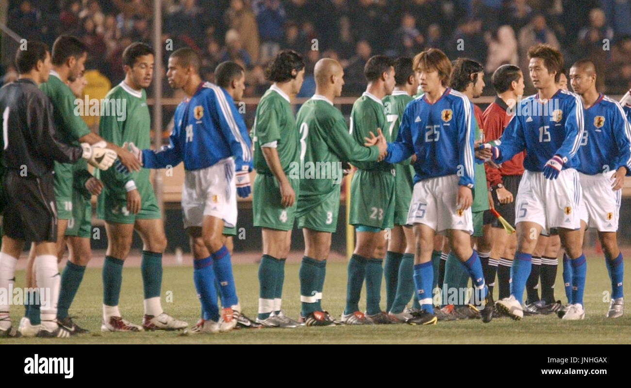 TOKYO, Japan - Players of the Japanese and Iraqi national soccer teams ...