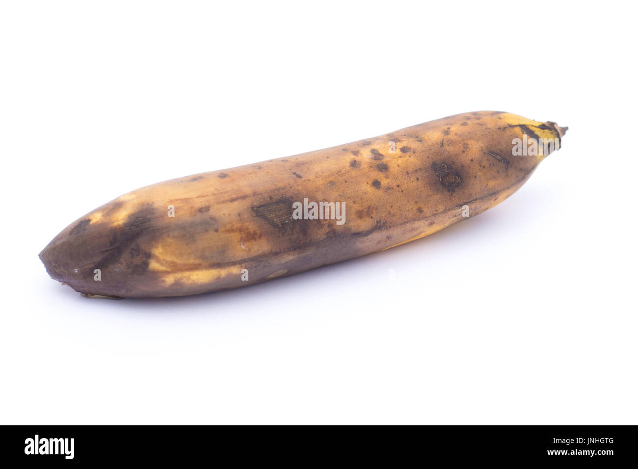 Rotted banana isolated on white background Stock Photo - Alamy