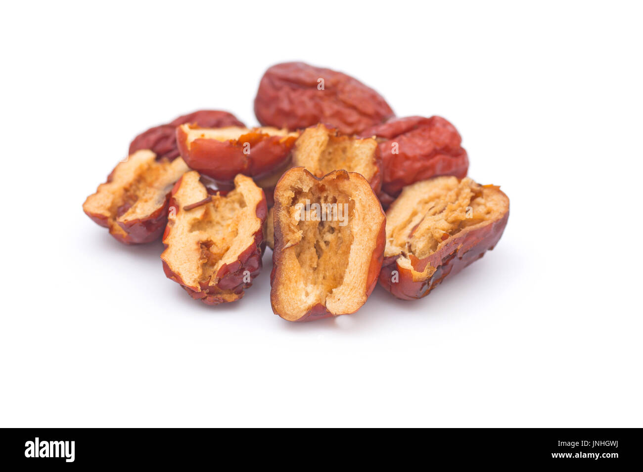 dried jujube fruits, chinese herbal medicine in bowl isolated on white ...
