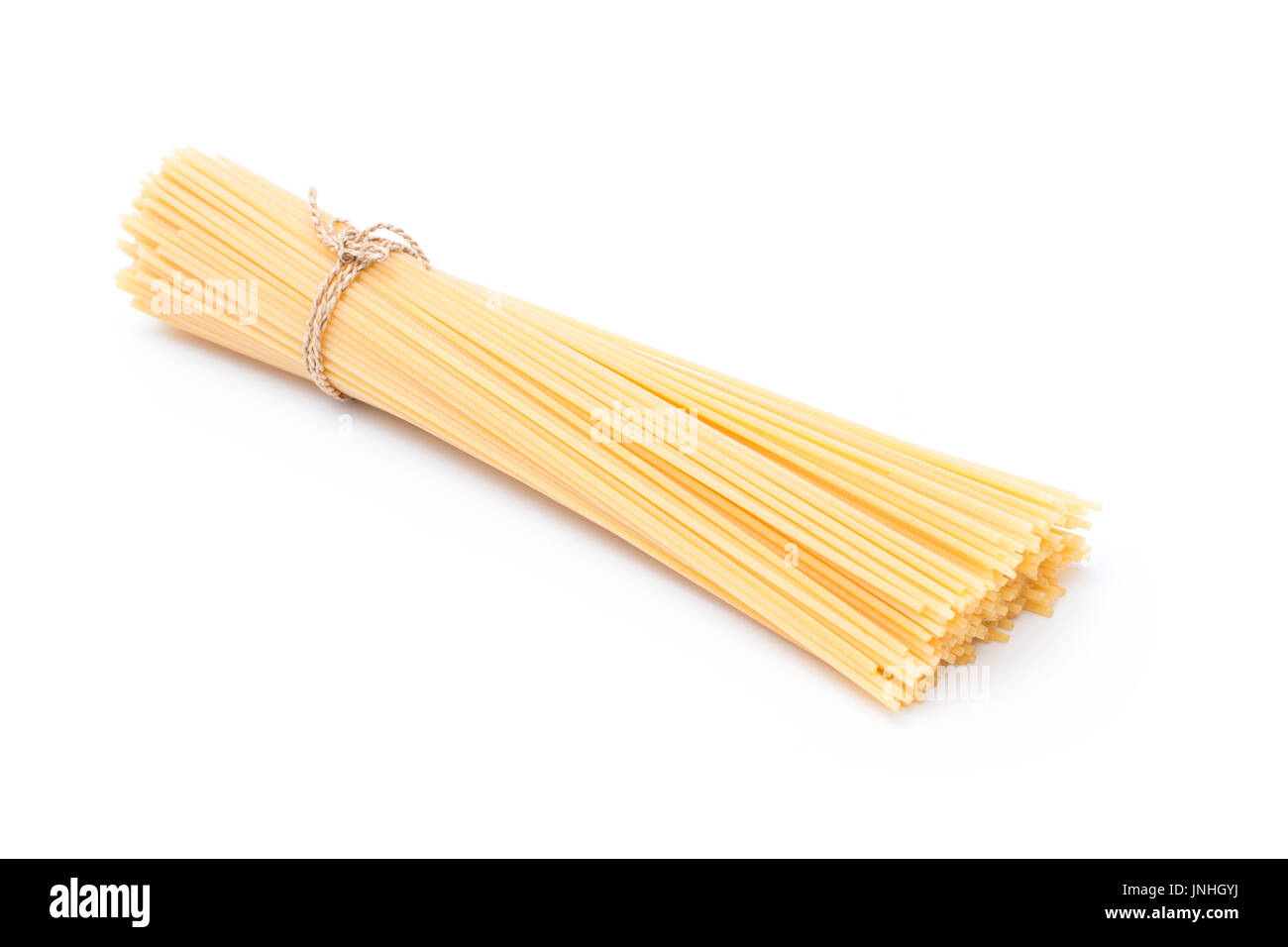 Raw spaghetti isolated on white background Stock Photo - Alamy