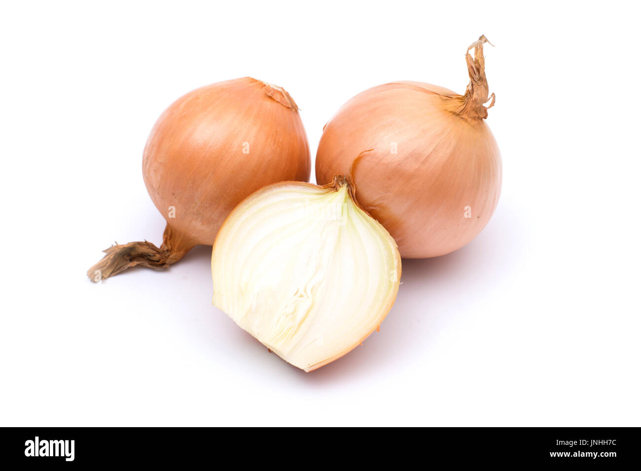 Ripe onion on a white background Stock Photo - Alamy