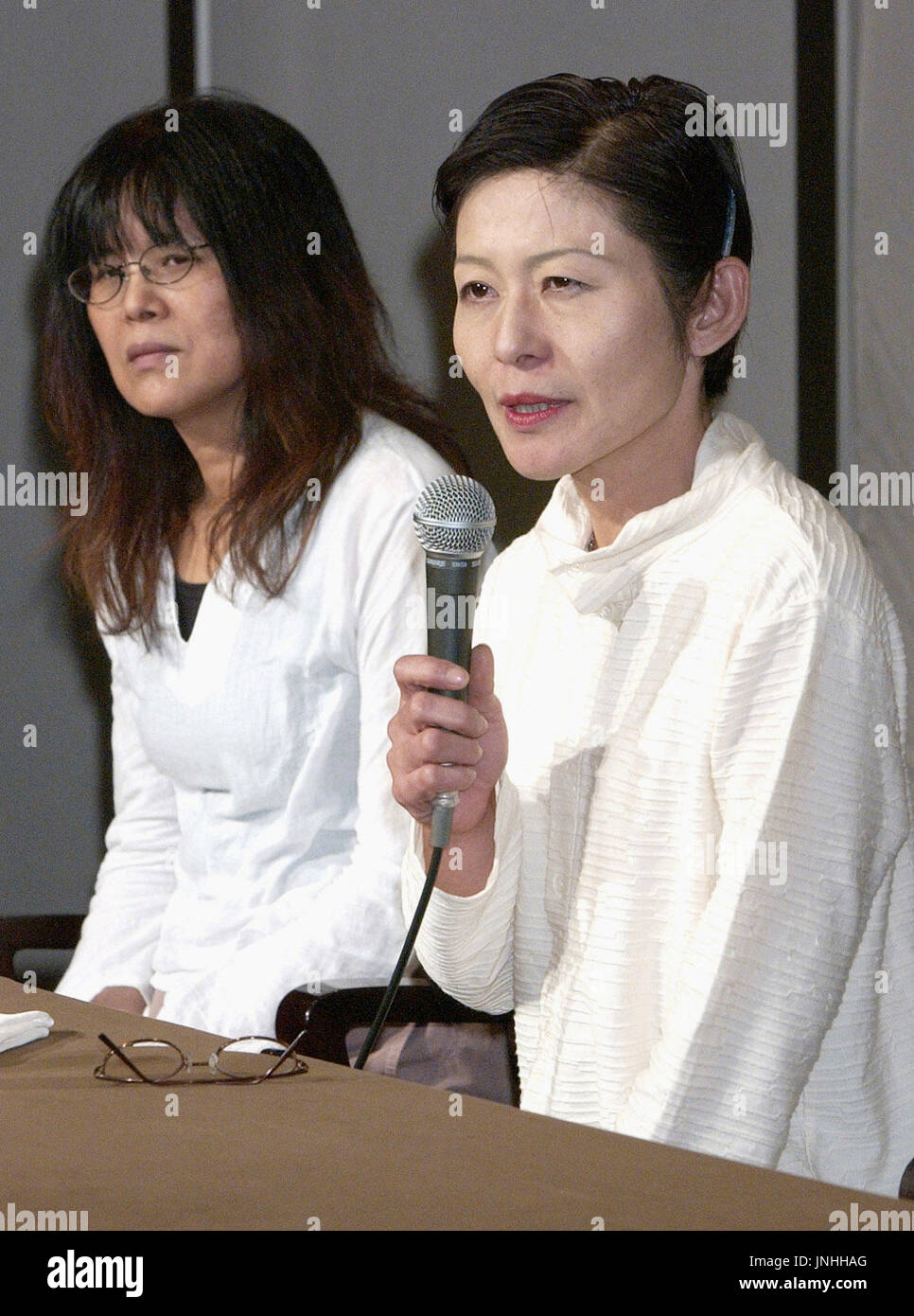 TOKYO, Japan - Yukiko Hashida (R), wife of Japanese freeland journalist ...