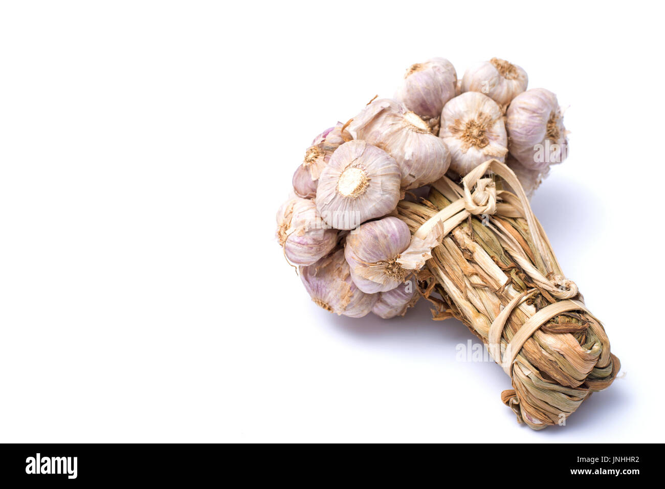 Bunch of garlic isolated on white background Stock Photo - Alamy