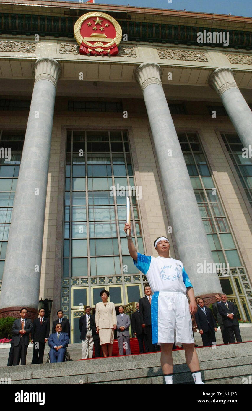 BEIJING, China - The first runner of the Olympic torch relay stage in ...