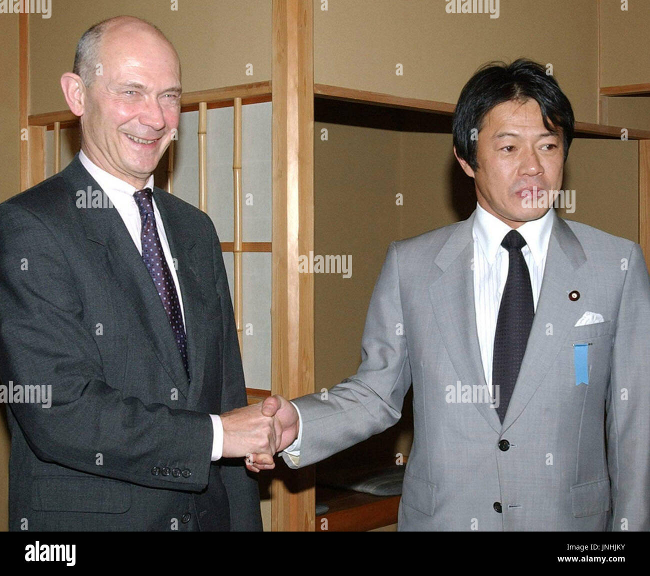 TOKYO, Japan - European Union Trade Commissioner Pascal Lamy (L) shakes ...