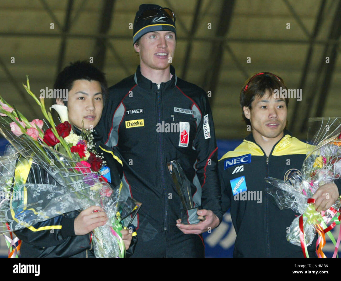 HARBIN, China - Jeremy Wotherspoon of Canada (C) poses after winning ...