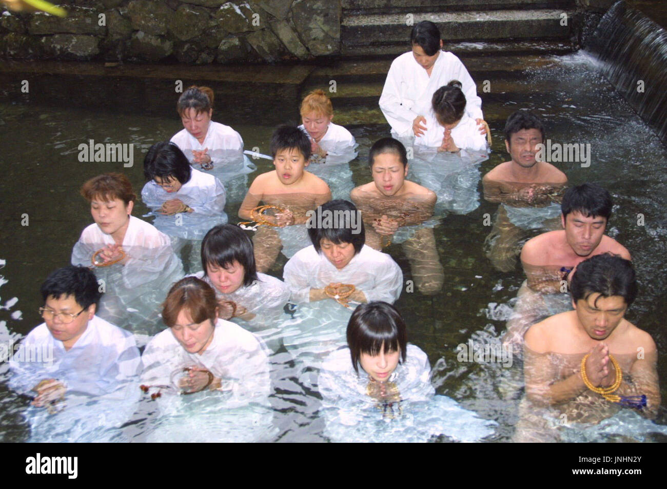 KOYA, Japan - Adults and children take part in a cold water ritual Jan ...