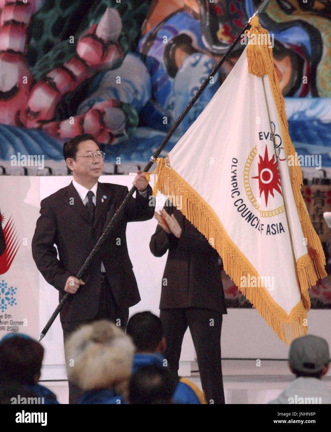 AOMORI, Japan - The flag of the Winter Asian Games is handed over to a ...