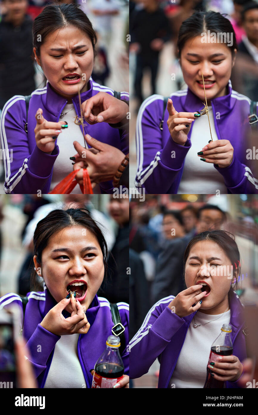 Chinese girl in sport gear on Wangfujing Market, Beijing, China trying ...