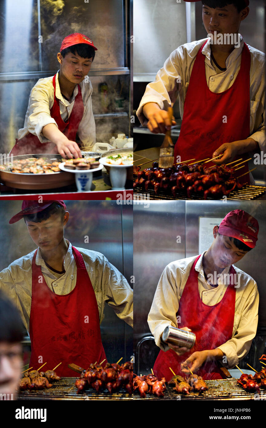 Cute Chinese salesman seasoning meat on skewers on traditional food ...