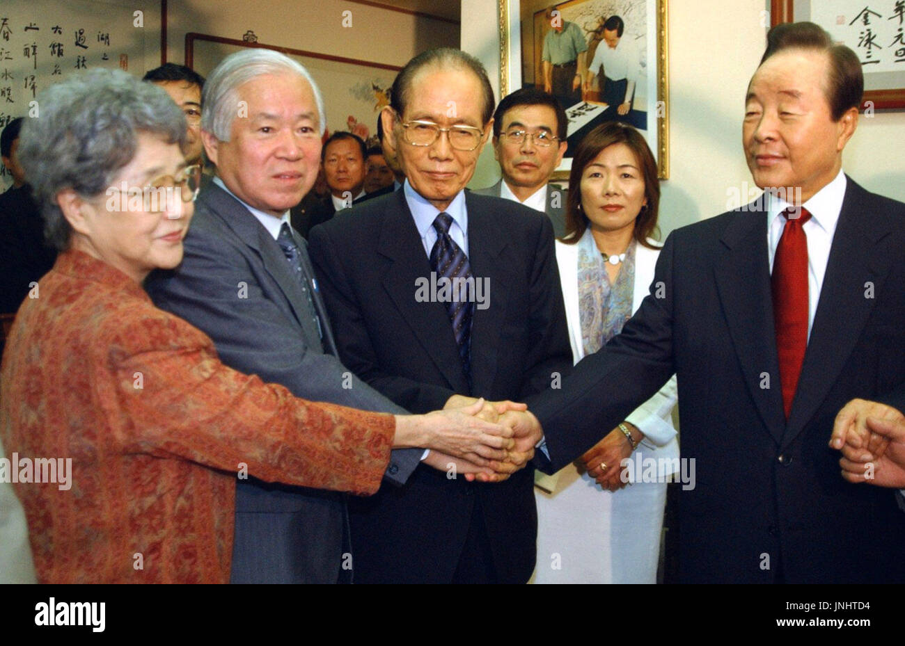 SEOUL, South Korea - Shigeru (2nd from L) and Sakie Yokota (L), whose ...