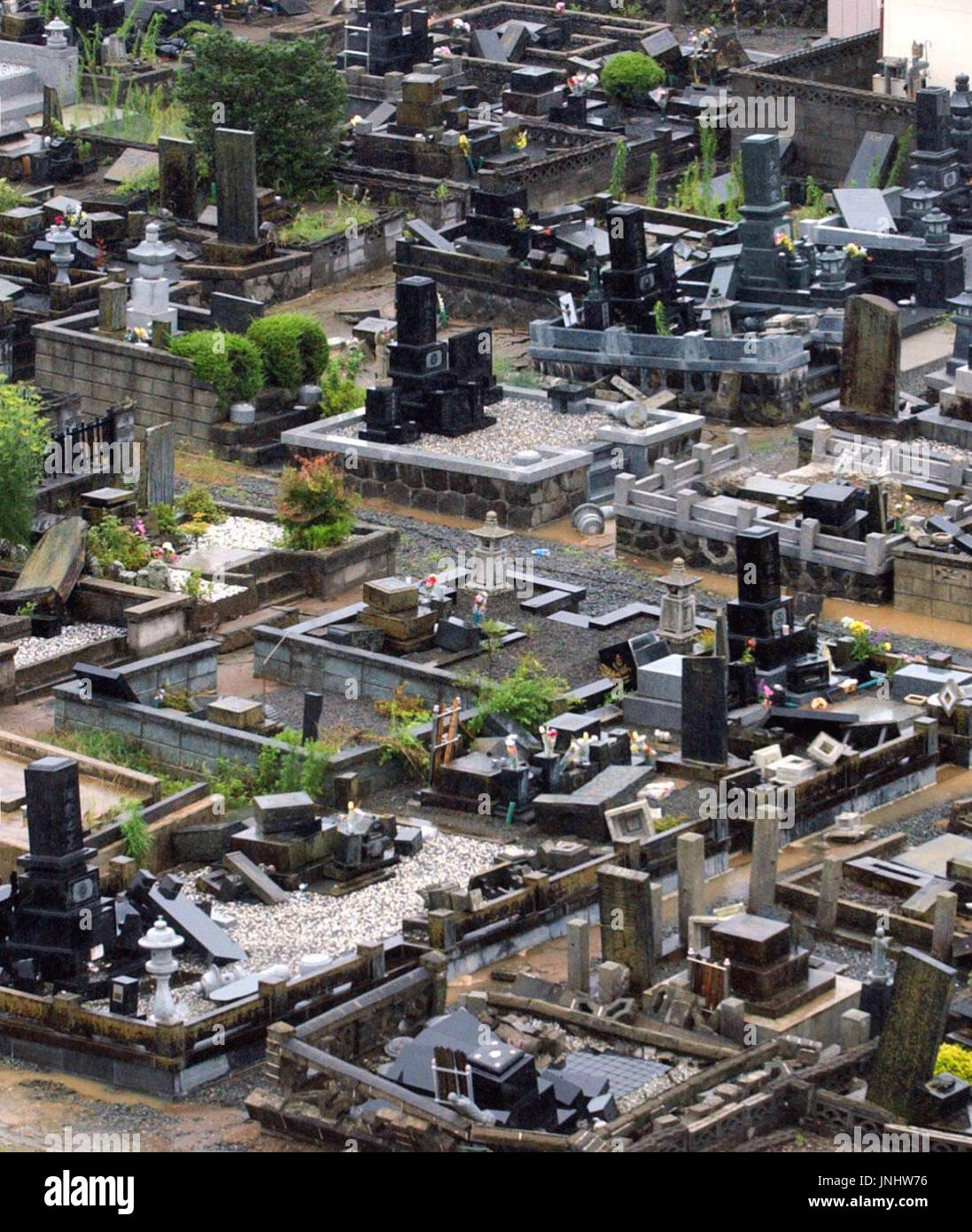 SENDAI, Japan - Tombstones are destroyed in the town of Nango, Miyagi ...