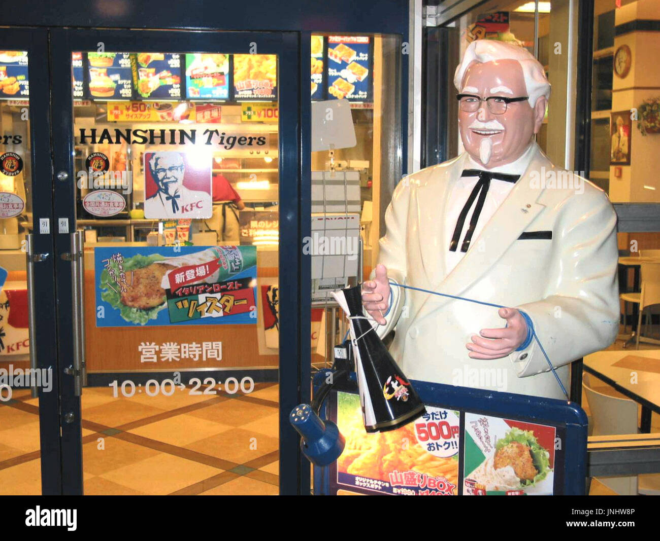 KOBE, Japan - A Colonel Sanders mannequin is forced to carry a Hanshin ...