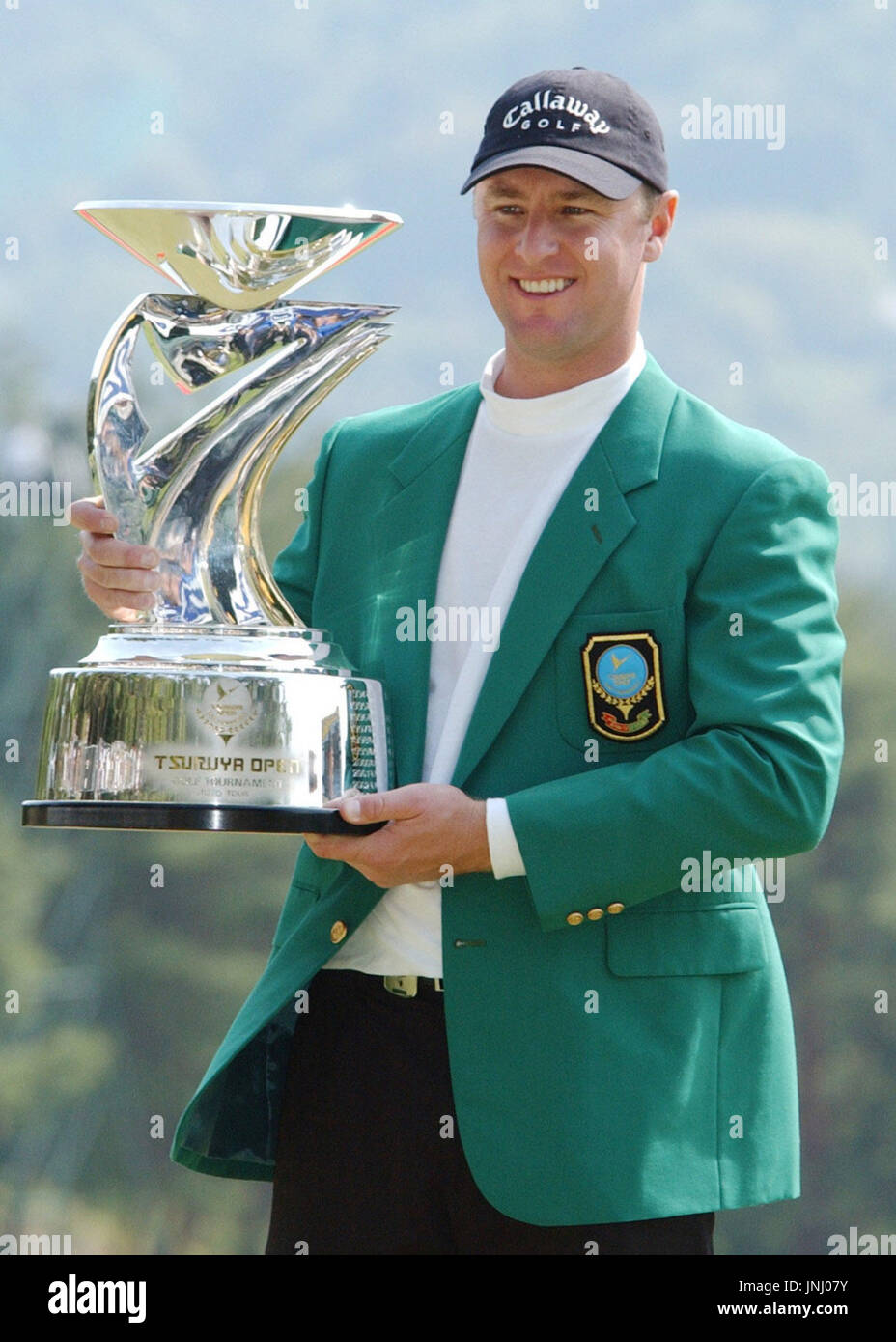 KAWANISHI, Japan - Australia's Brendan Jones smiles with his trophy in ...
