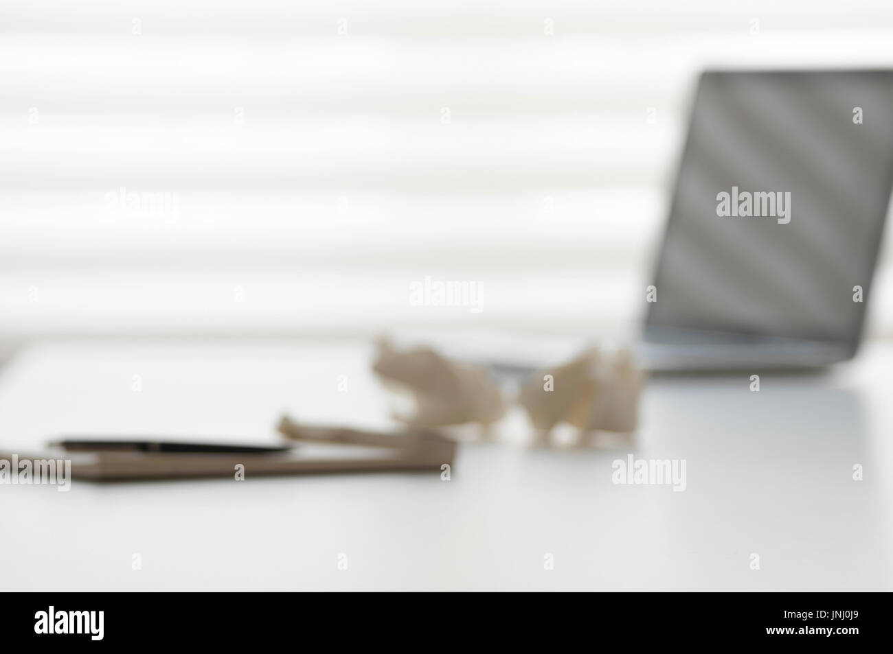 notebook and notepad on white office desk Stock Photo - Alamy