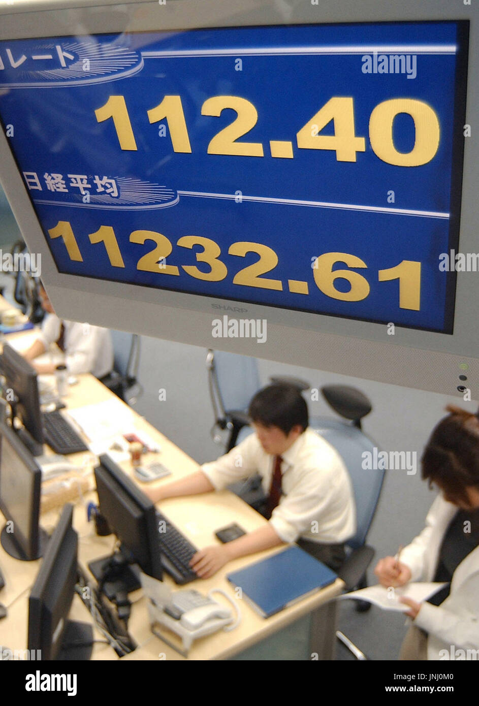 TOKYO, Japan - An electric board in Tokyo shows the dollar soaring ...