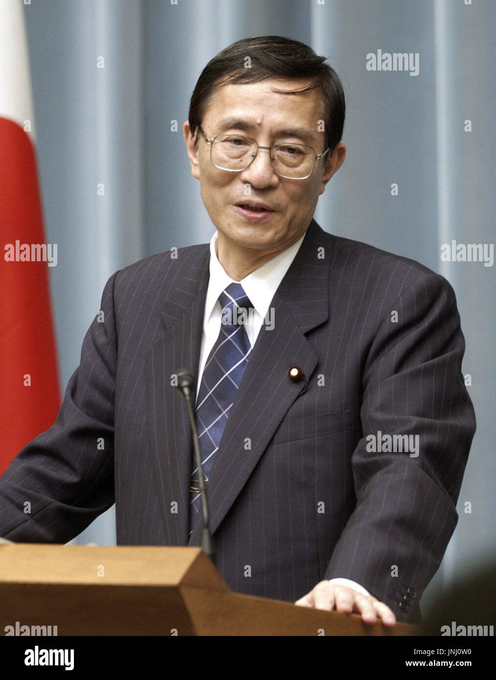TOKYO, Japan - Chief Cabinet Secretary Hiroyuki Hosoda announces at a ...