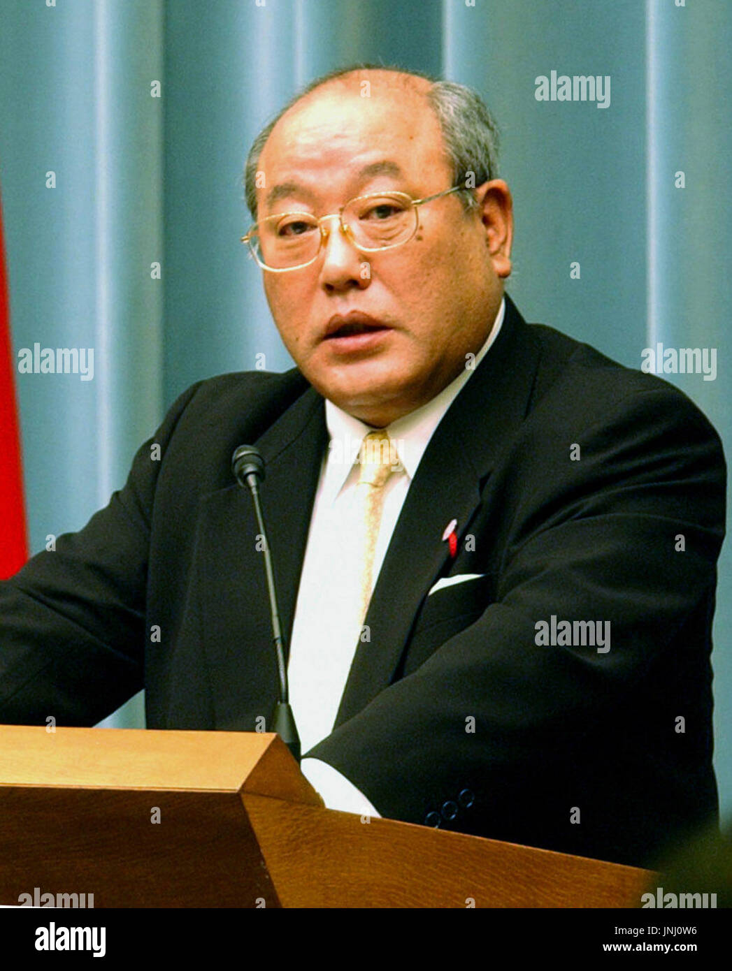 TOKYO, Japan - Isao Iijima, a secretary to Prime Minister Junichiro ...